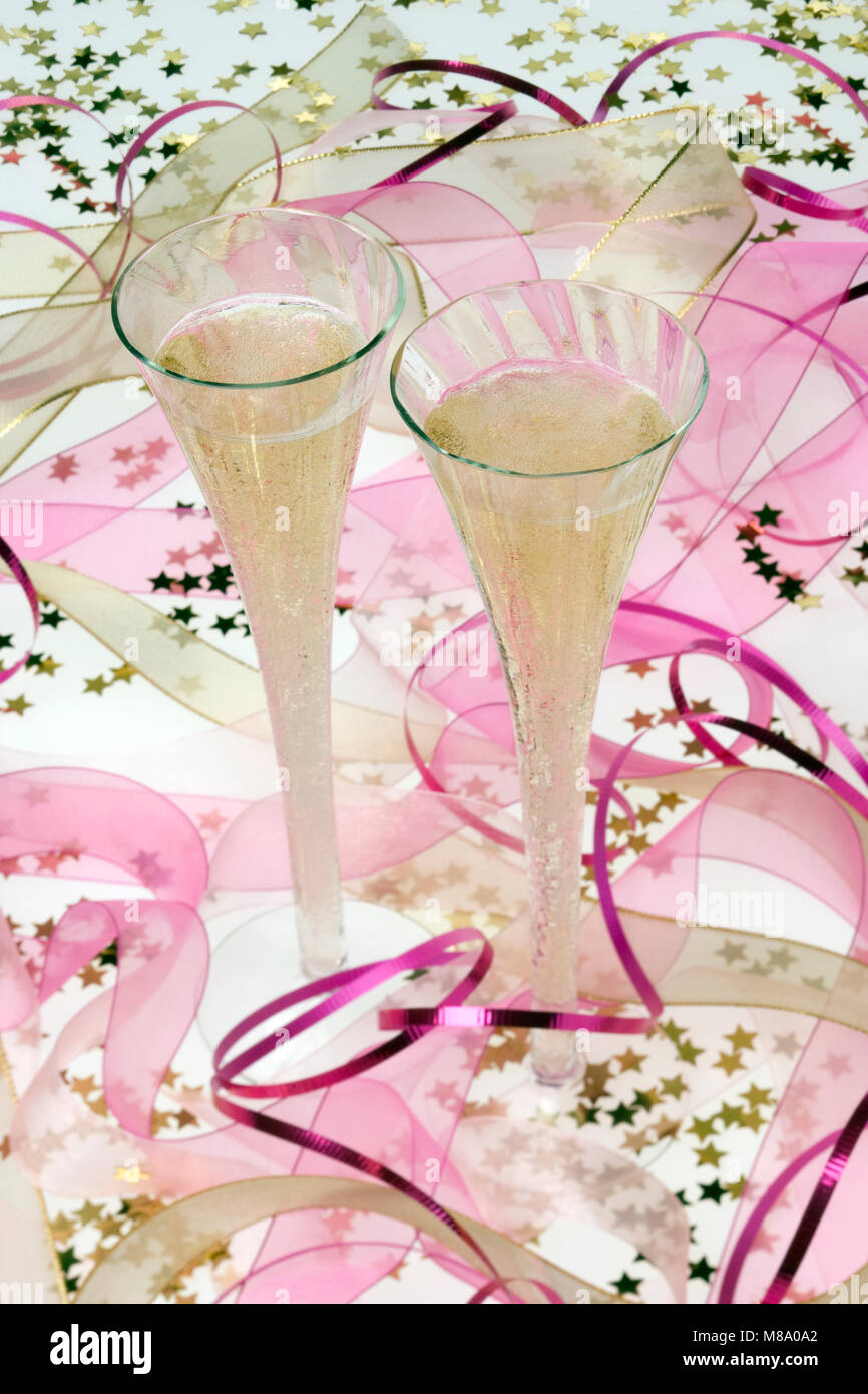Decorated celebration still Life With champagne glasses Stock Photo - Alamy