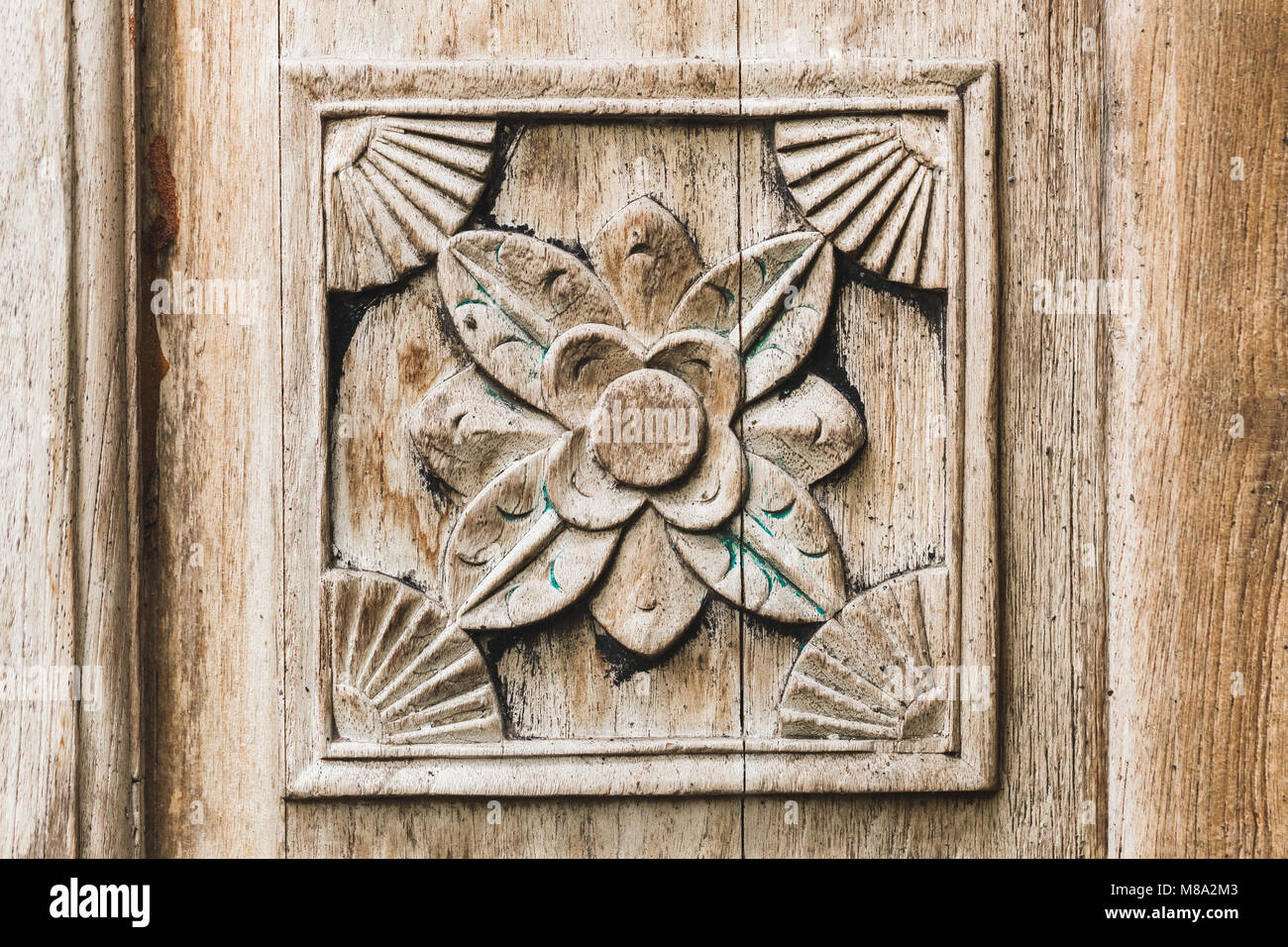 Balinese wooden carving texture on wall Stock Photo - Alamy