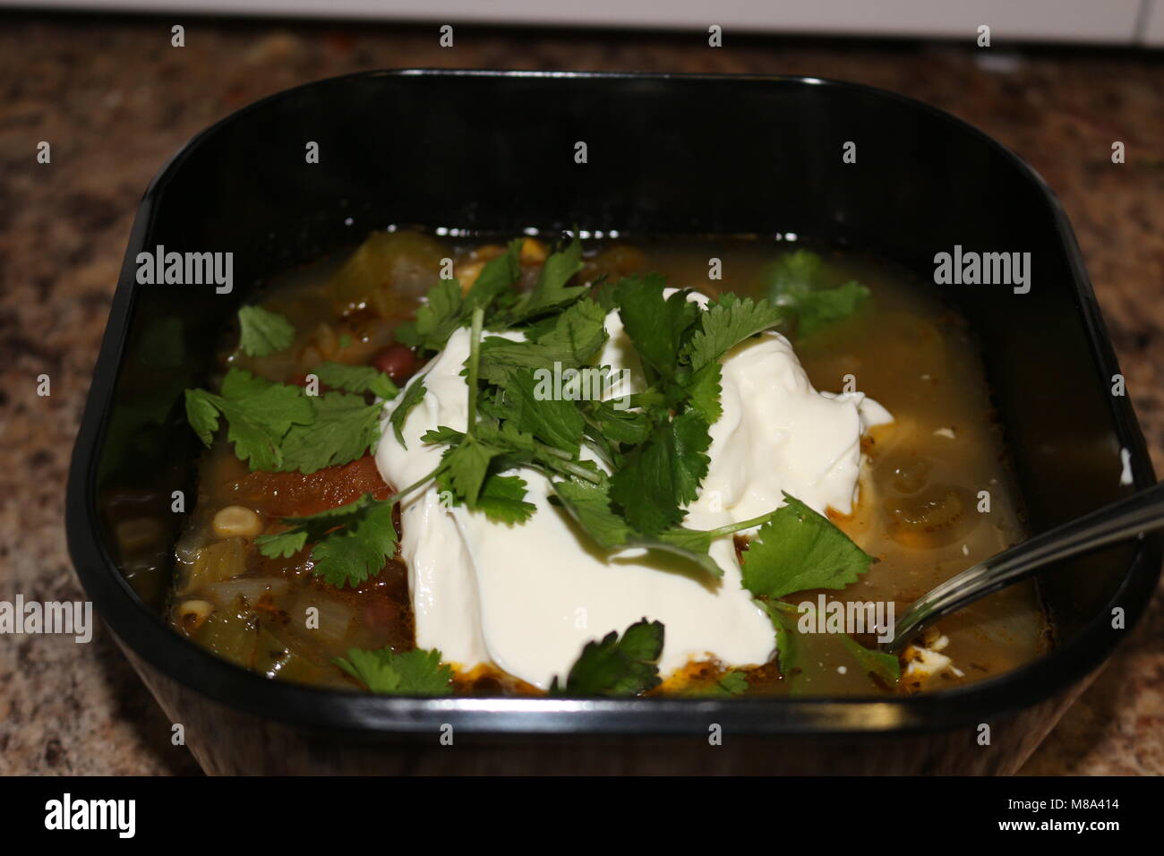 Fresh hot South American Aztec soup with cream Stock Photo - Alamy