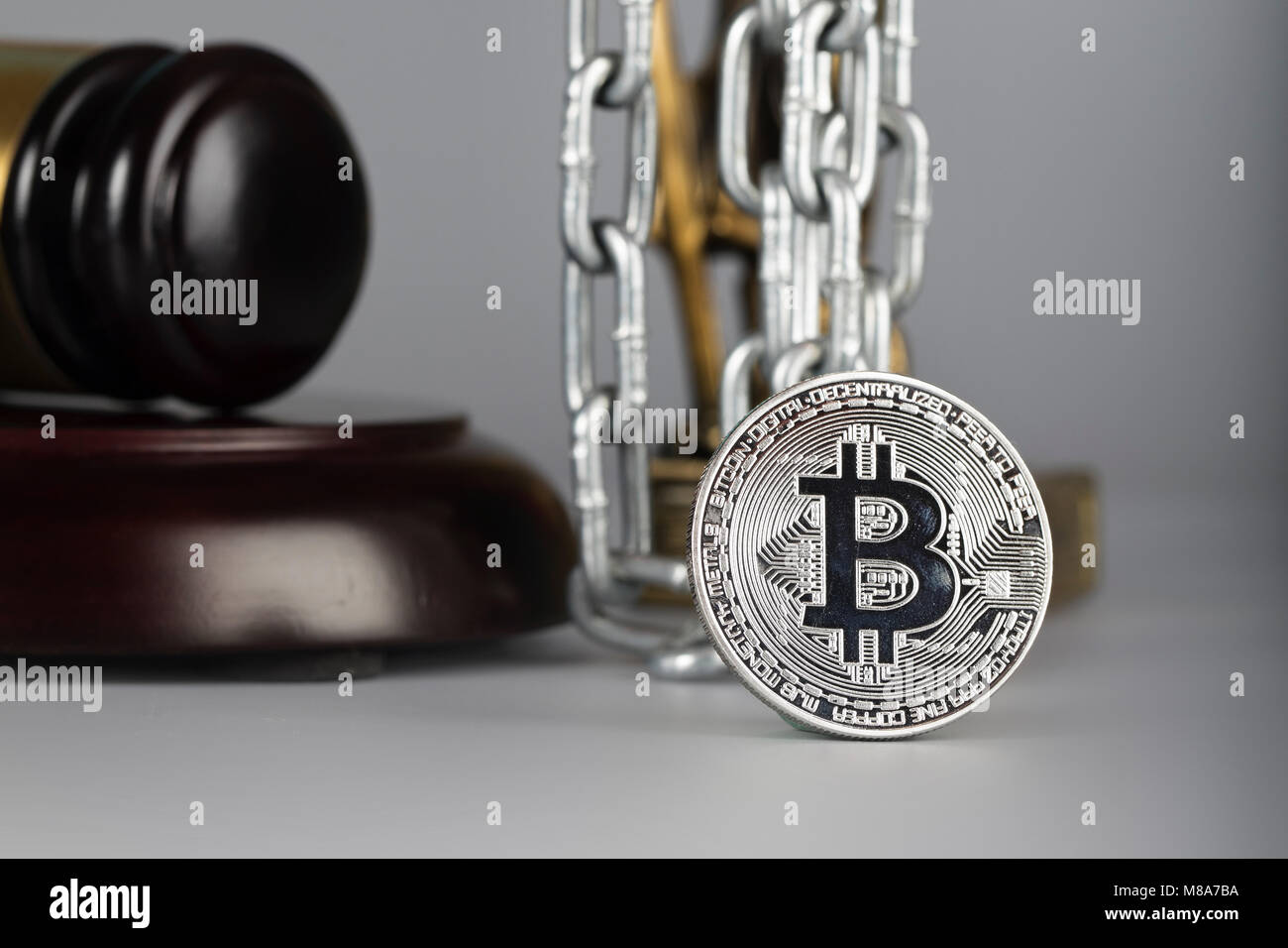 View at bitcoin. Statue of Themis and metallic chain in the background ...