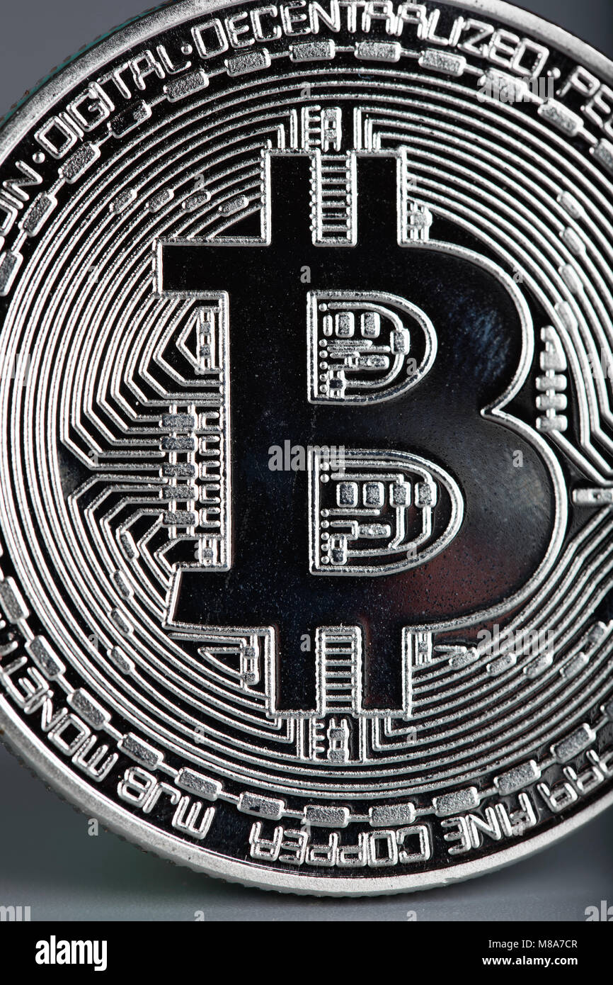 Closeup of digital asset -bitcoin. Gray background Stock Photo - Alamy