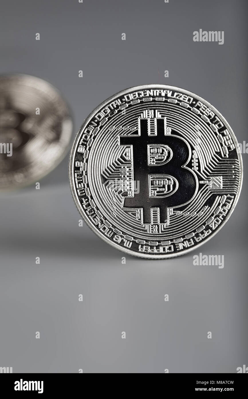 Closeup of digital asset -bitcoin. Gray background Stock Photo - Alamy