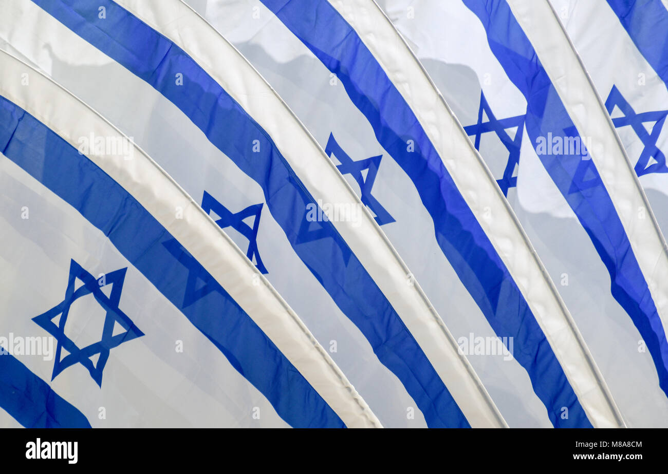 Set of five Israeli flags blowing in the wind Stock Photo - Alamy