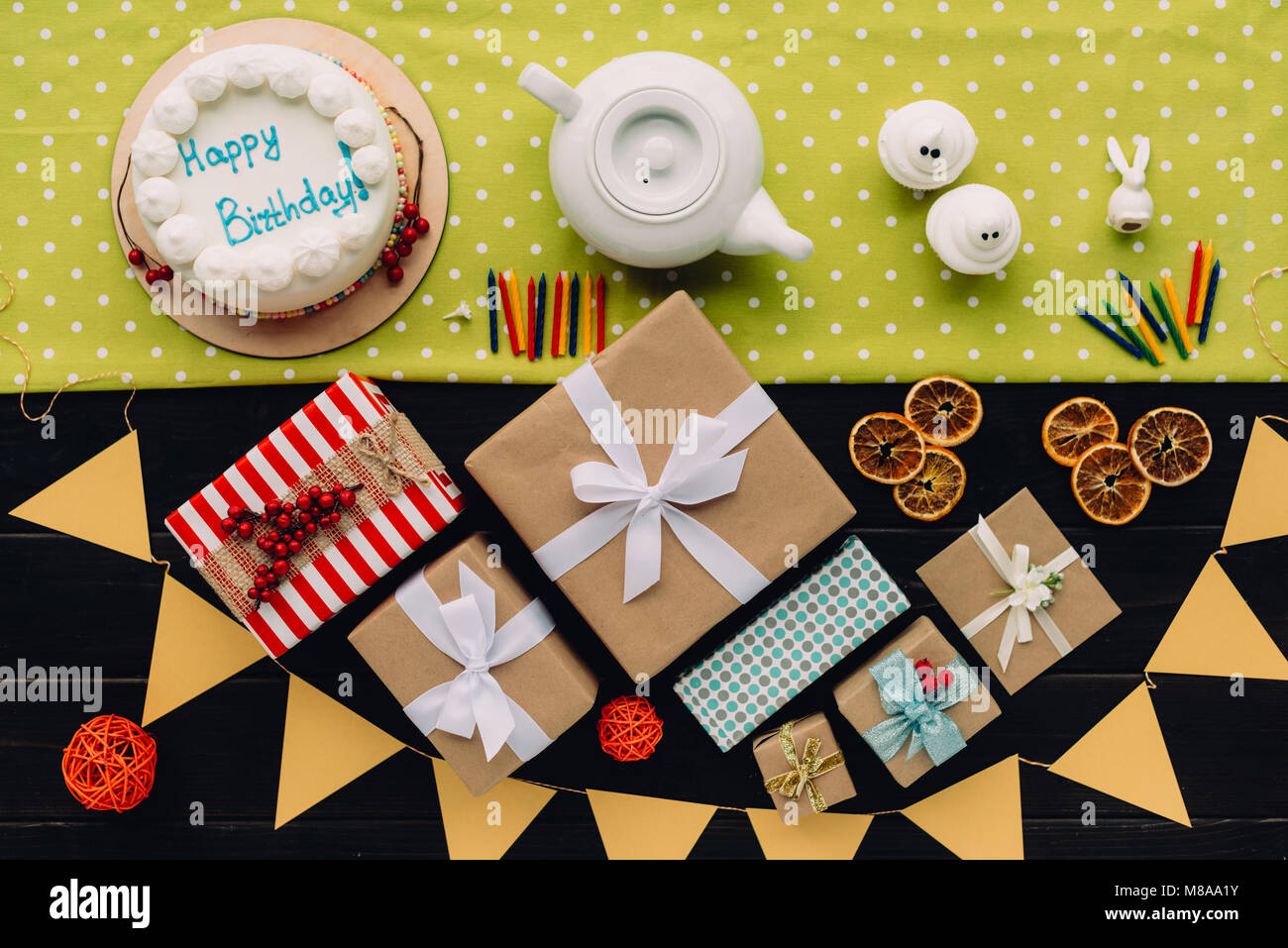 present boxes and birthday cake Stock Photo - Alamy