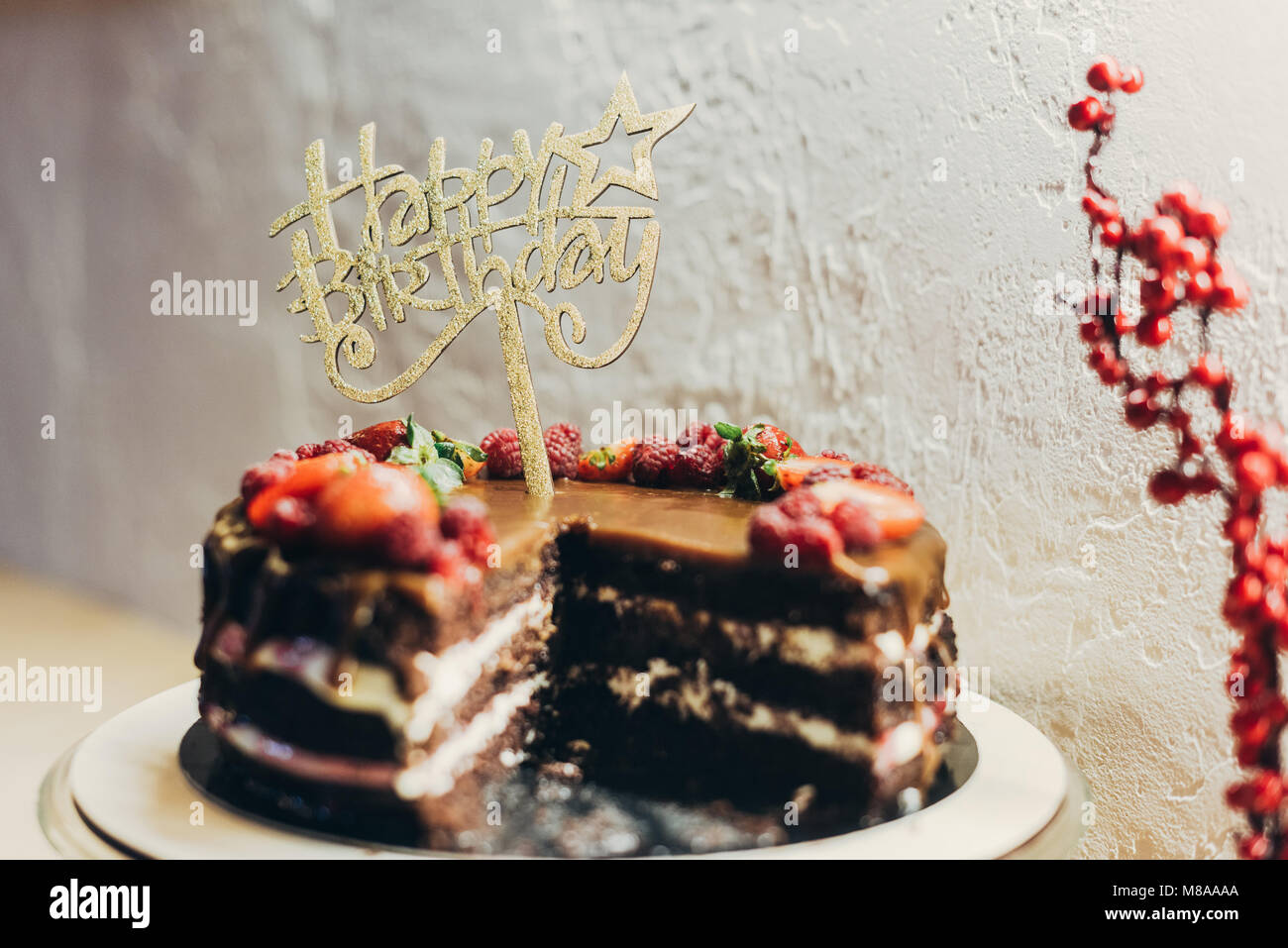 Cake with Happy Birthday sign Stock Photo - Alamy