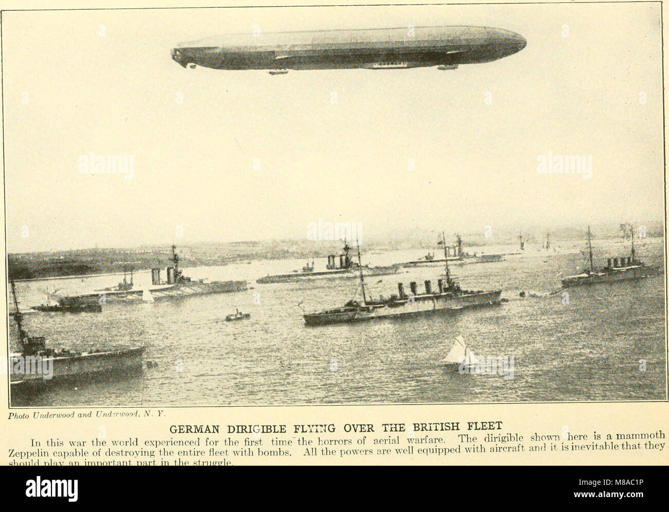 This image depicts a German dirigible flying over the British fleet ...
