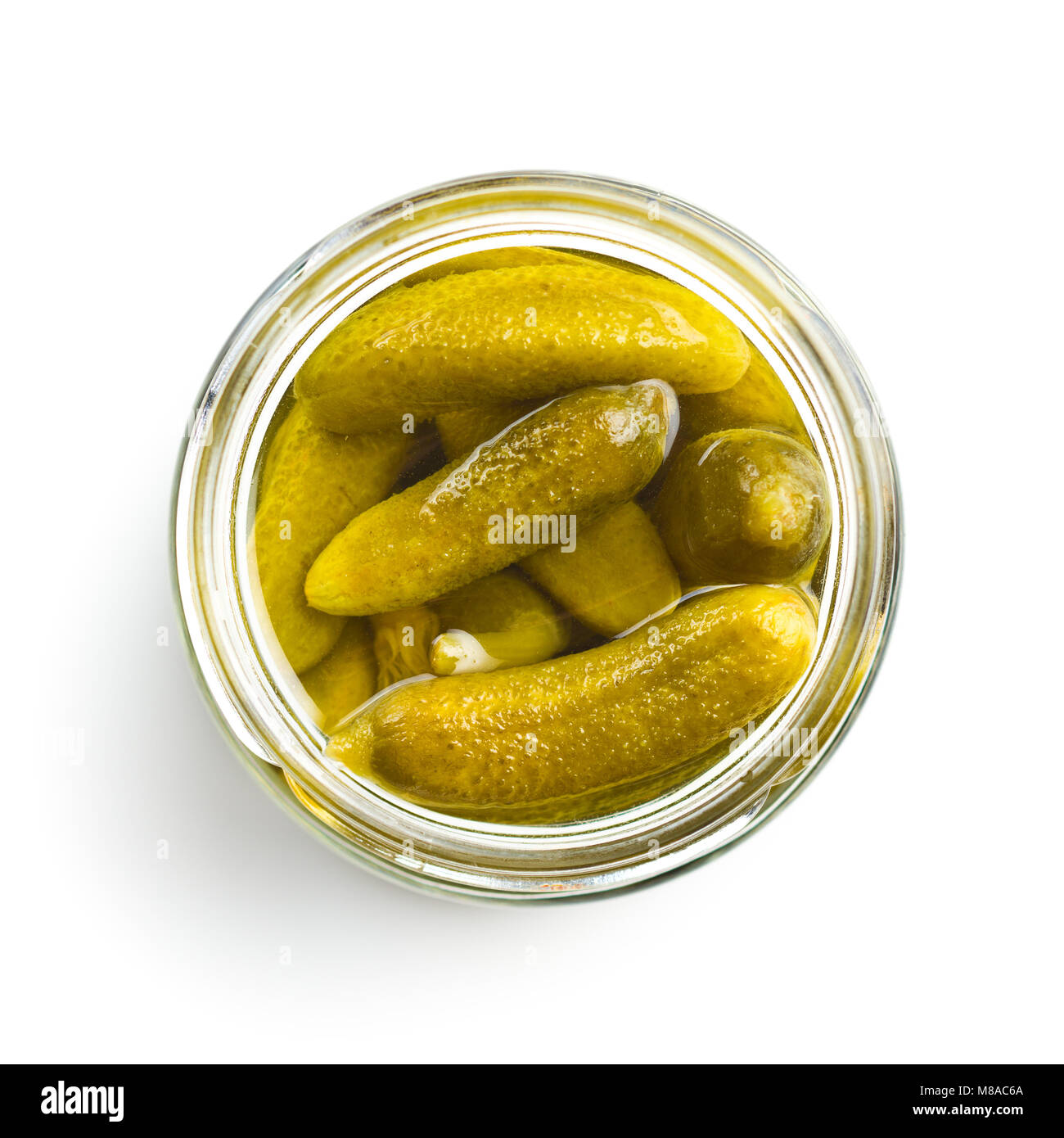Pickles in jar. Preserved cucumbers isolated on white background Stock ...