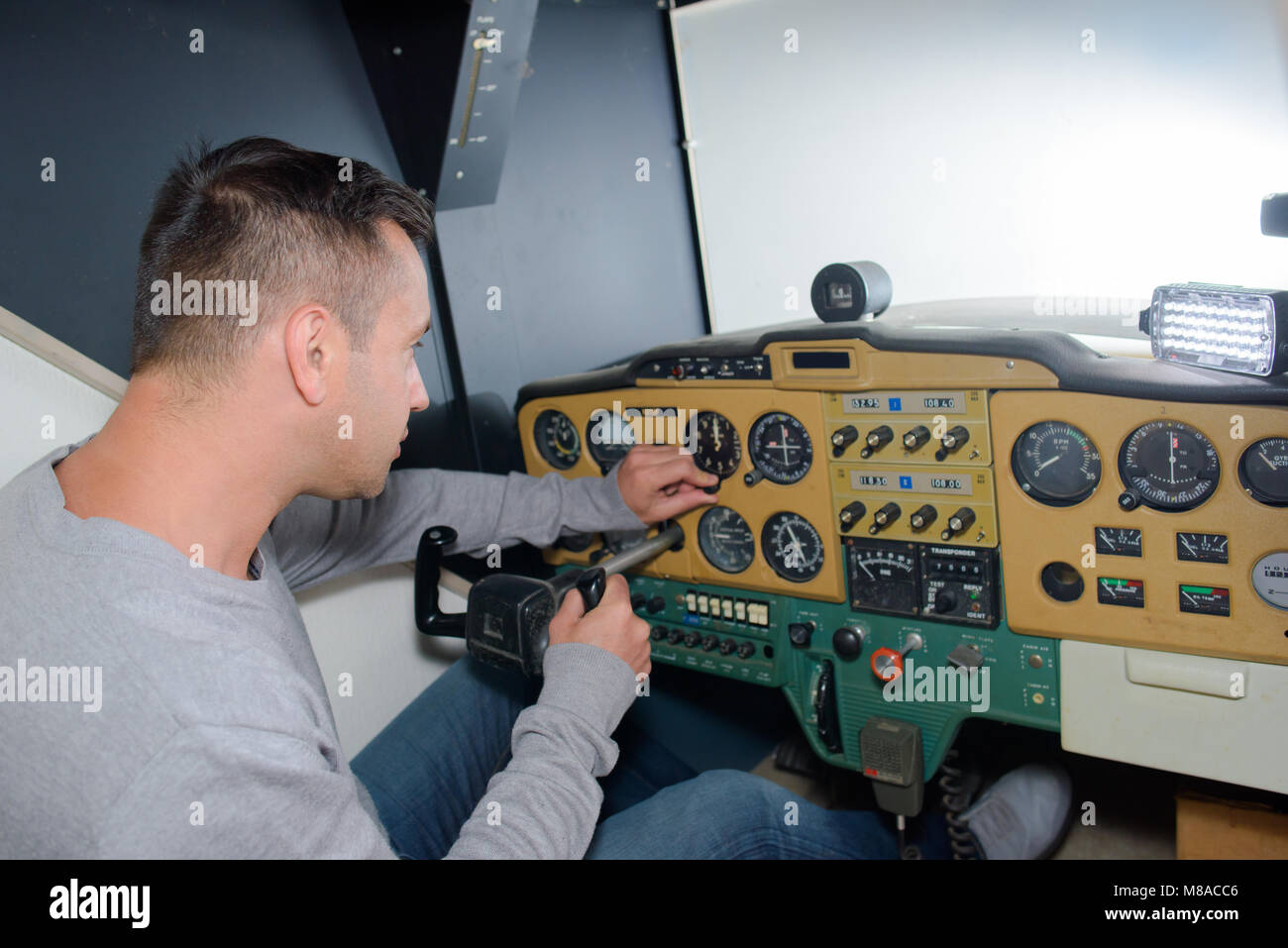 Pilot in cockpit flight simulator hi-res stock photography and images ...