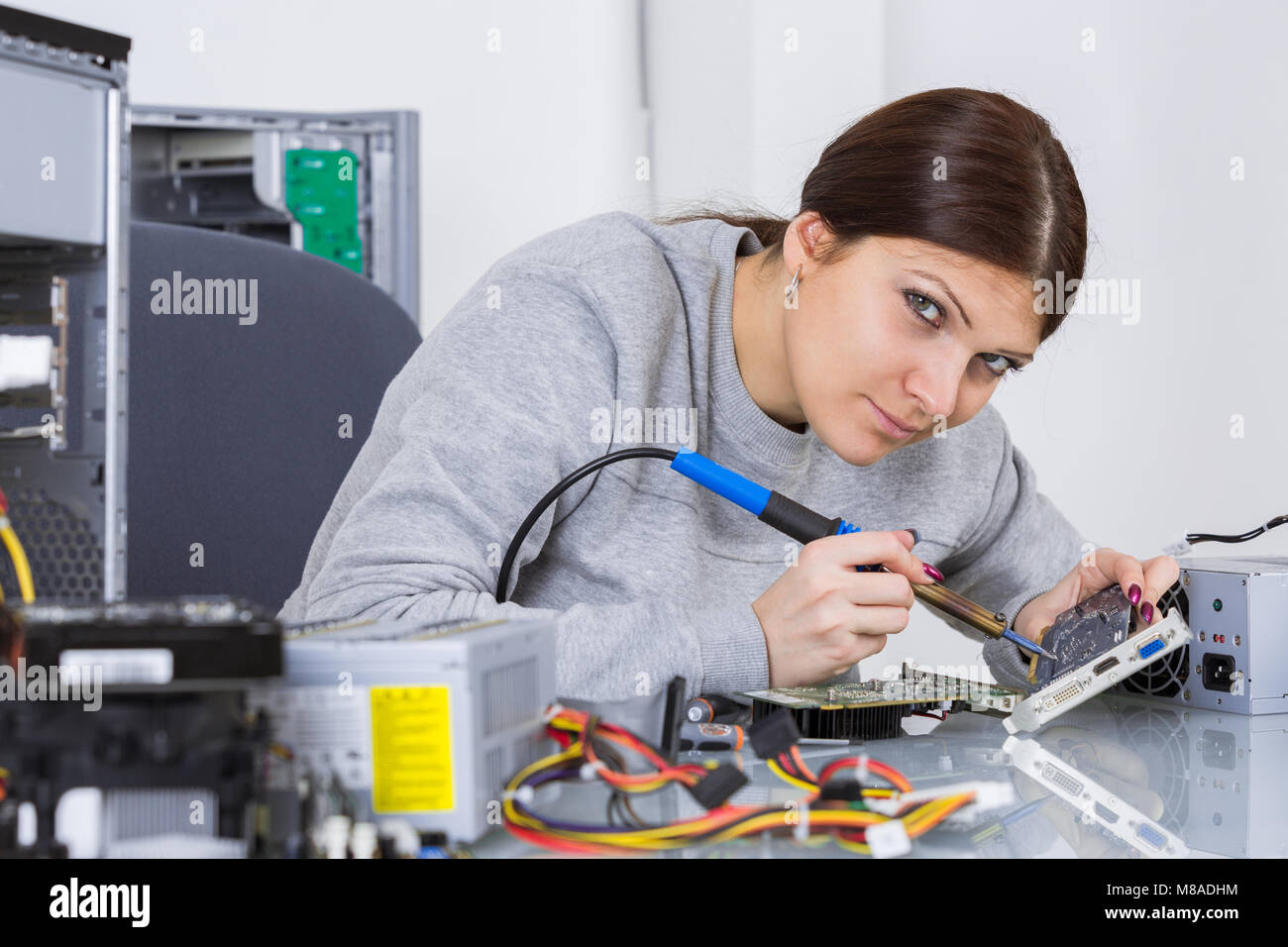 Electronic equipment assembler hi-res stock photography and images - Alamy