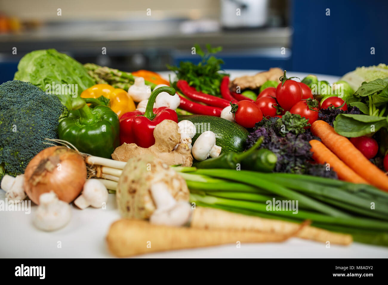Group of various vegetables on the kitchen board Stock Photo - Alamy