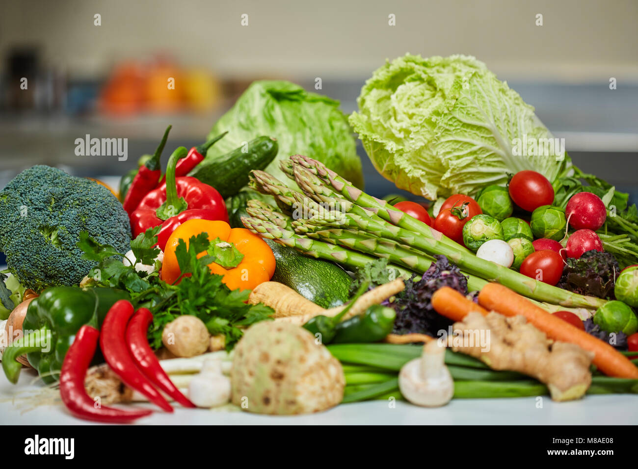 Group of various vegetables on the kitchen board Stock Photo - Alamy