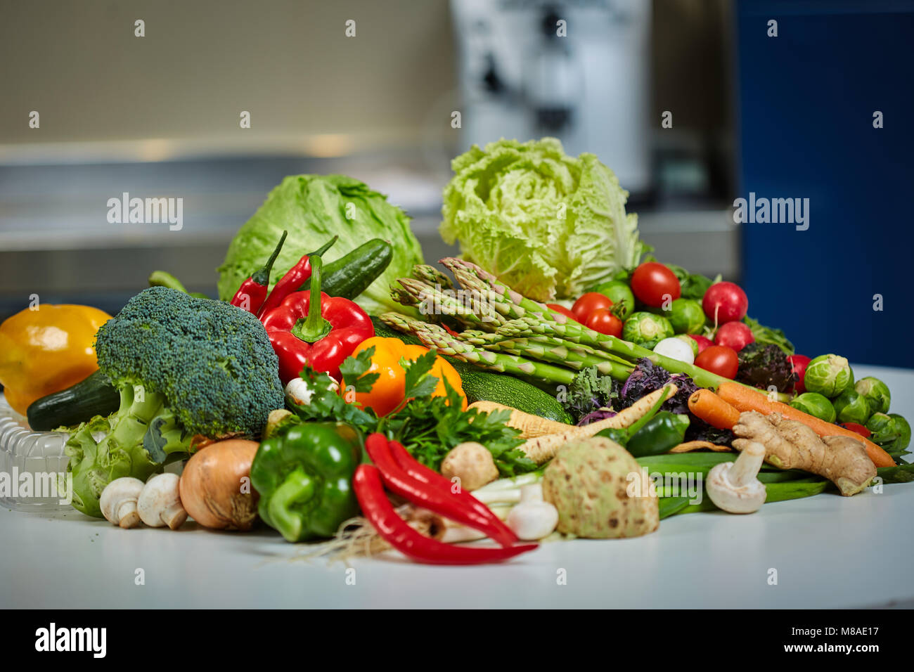 Group of various vegetables on the kitchen board Stock Photo - Alamy