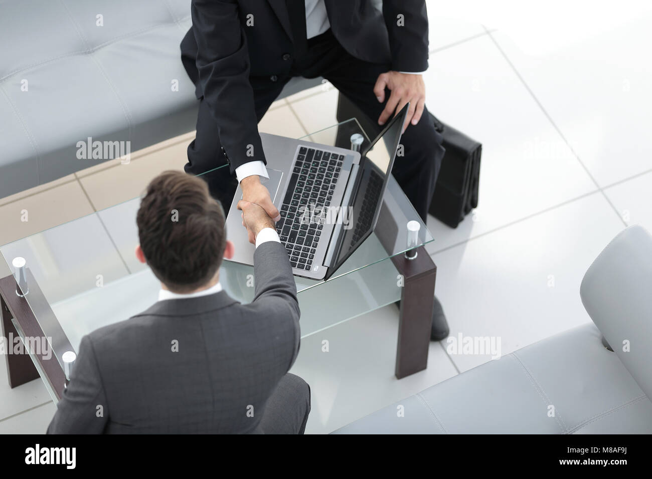 handshake business people in the workplace Stock Photo - Alamy