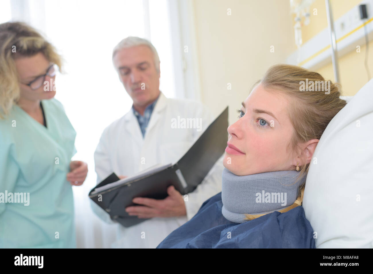 patient with neck support Stock Photo - Alamy