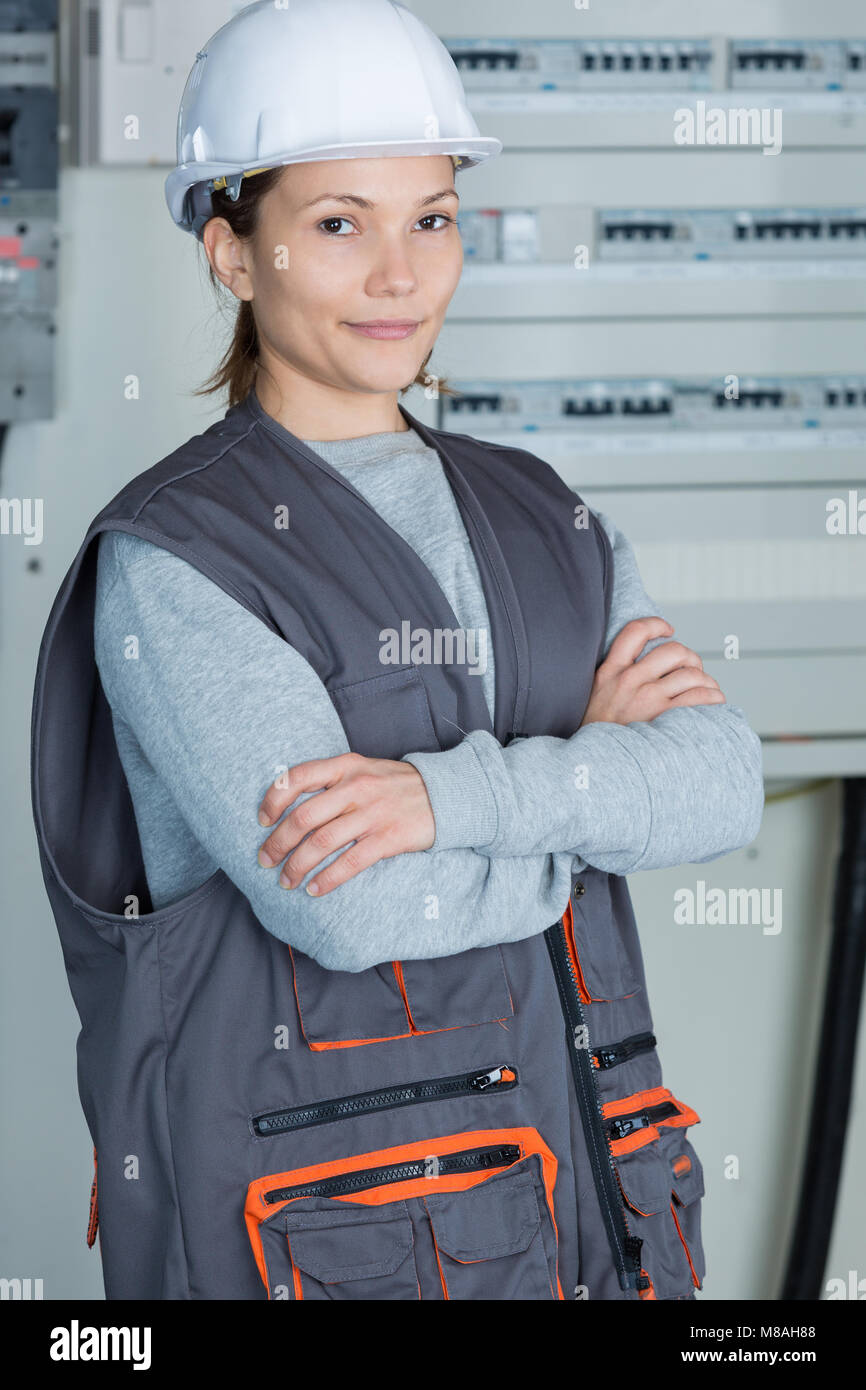 Young female electrician working fusebox hi-res stock photography and ...