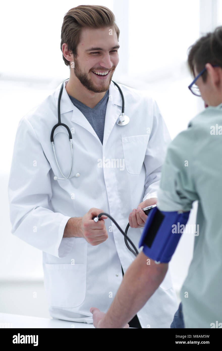 Doctor nurse doing checkup visit hi-res stock photography and images ...