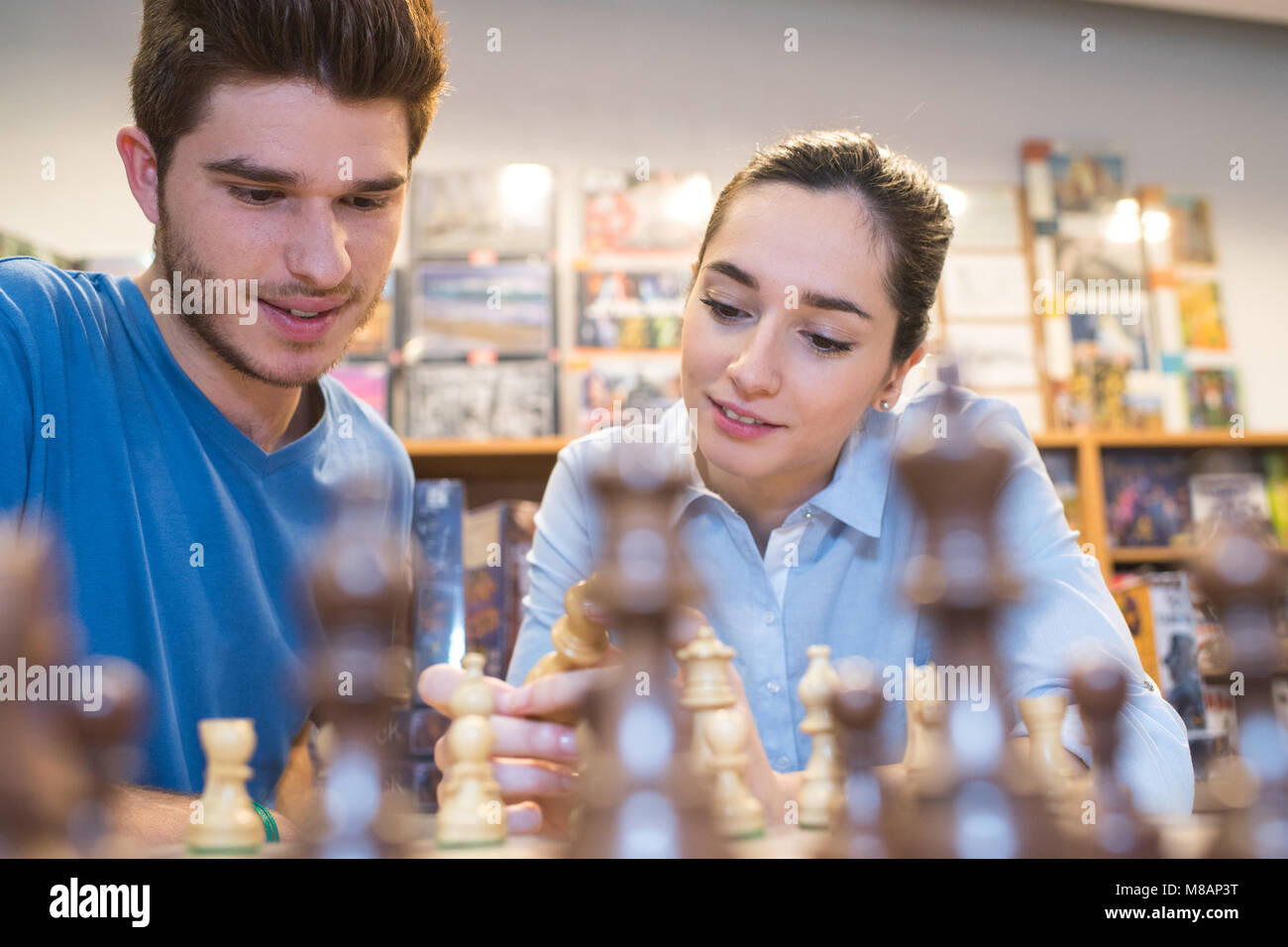 young players playing chess Stock Photo - Alamy