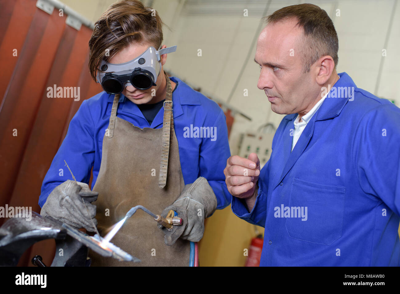 young welder under supervision Stock Photo - Alamy