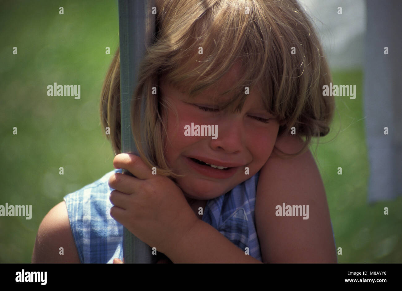 Little girl in playground having a tantrum Stock Photo - Alamy