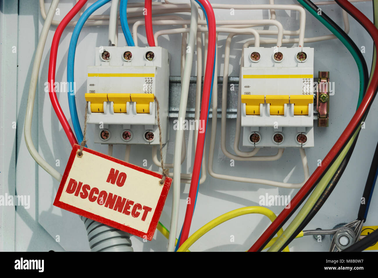 Three-phase electrical switchs and prohibition signs Stock Photo - Alamy