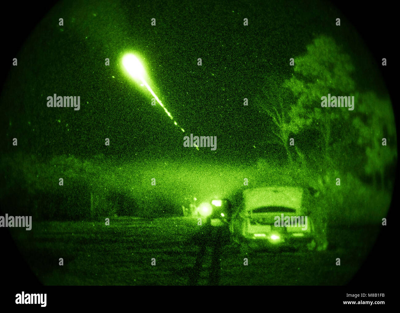 A pyrotechnic rocket is launched to simulate enemy rocket-propelled ...