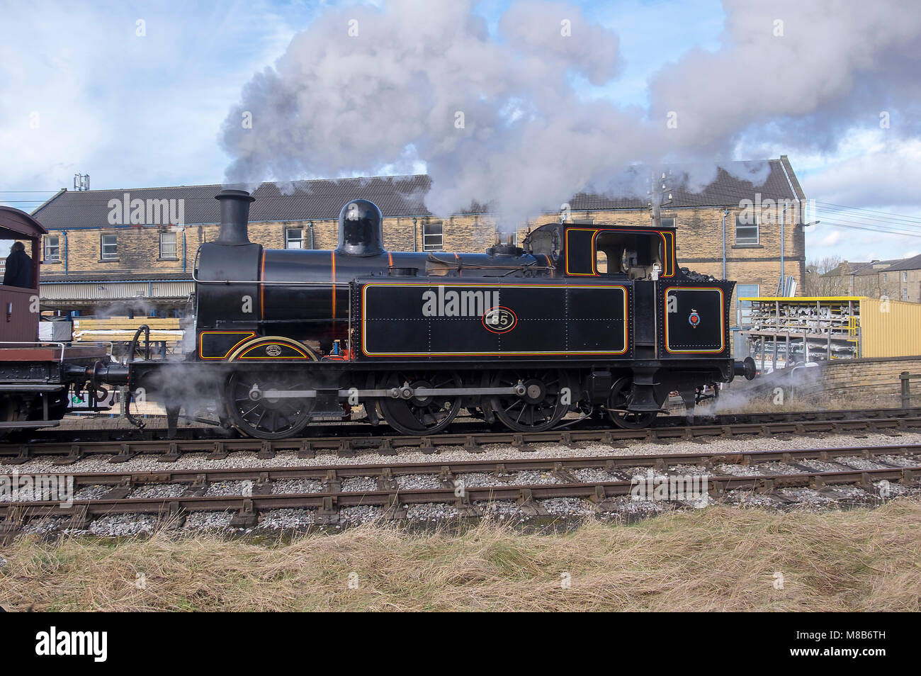 Small Tank Engine pulls out the Frieght on the Worth Valley Railway ...