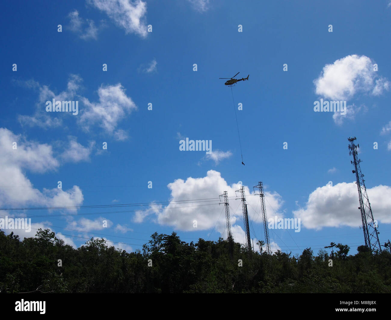 AGUADILLA PUEBLO, PUERTO RICO-- Linemen contracted by the U.S. Army ...