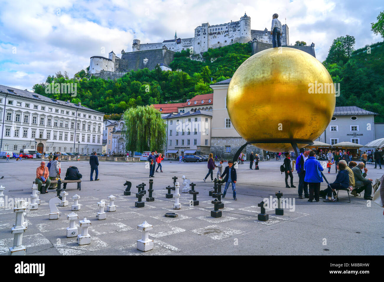SALZBURG AUSTRIA - SEPTEMBER 6 2017; Large golden sphere sculpture in ...