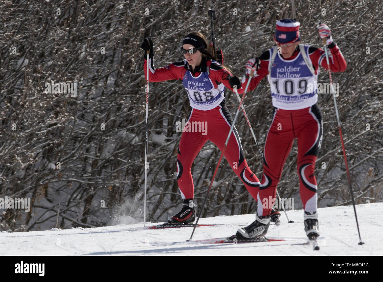 Army Staff Sgt. Stephanie T. Puro (#108) and Army Capt. Barbara Blanke (#109) race uphill during ...
