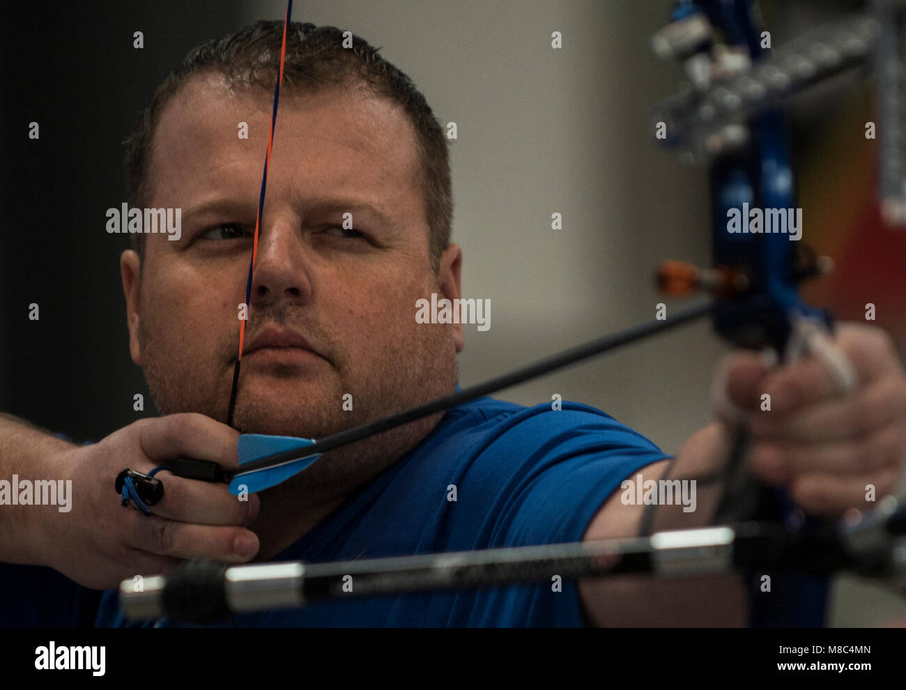 A competitor prepares to shoot an arrow during the archery event in the ...