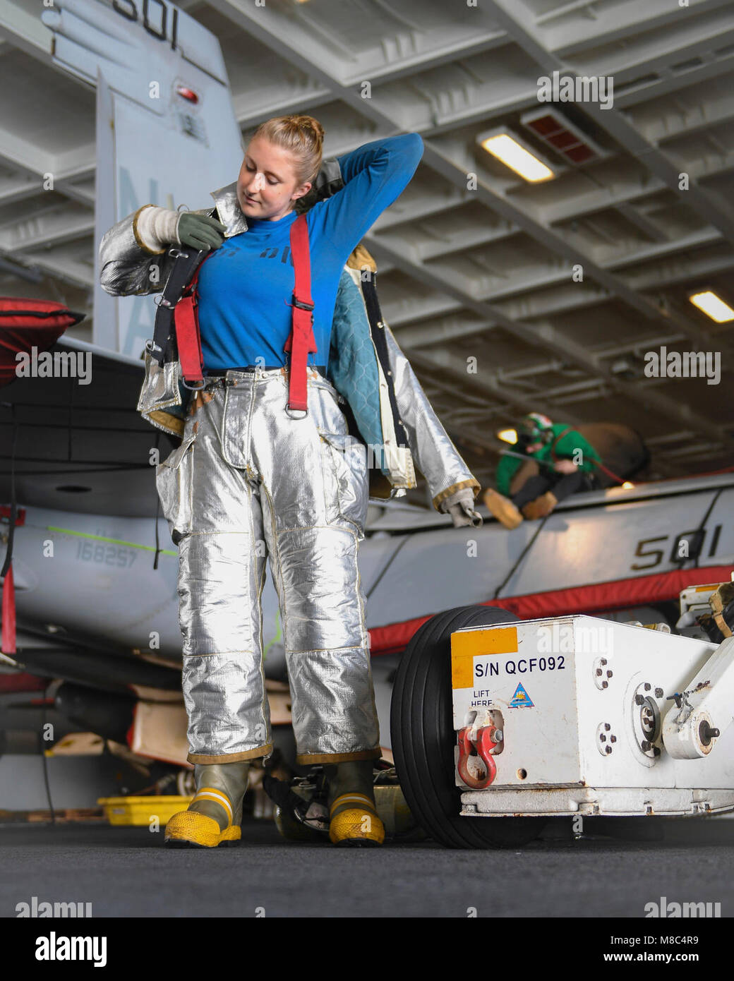ARABIAN GULF (Feb. 26, 2018) Airman Raven Adams dons a hot suit for a ...