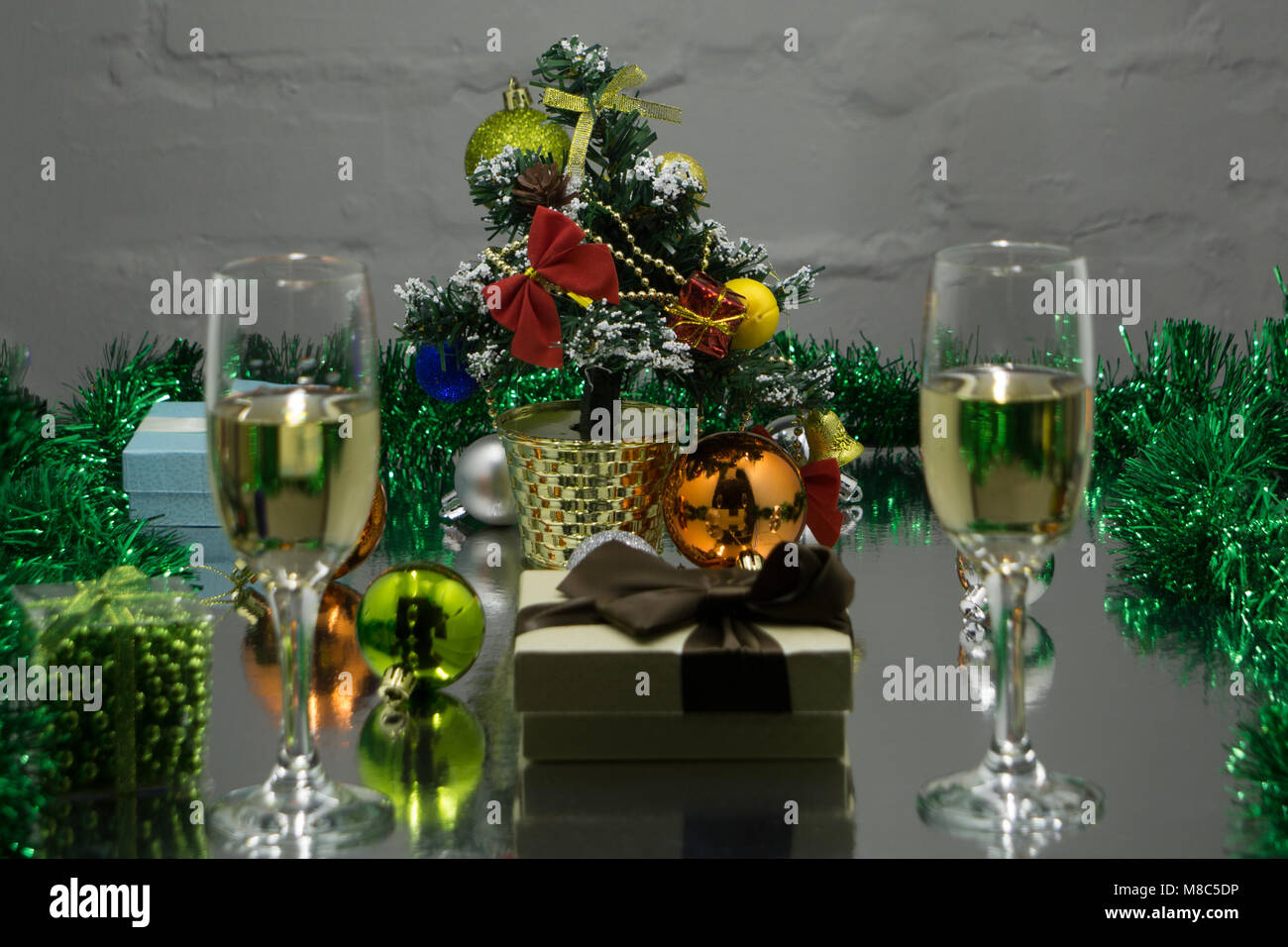 Abstract blurry background :Christmas or New Year. Champagne in glasses ...