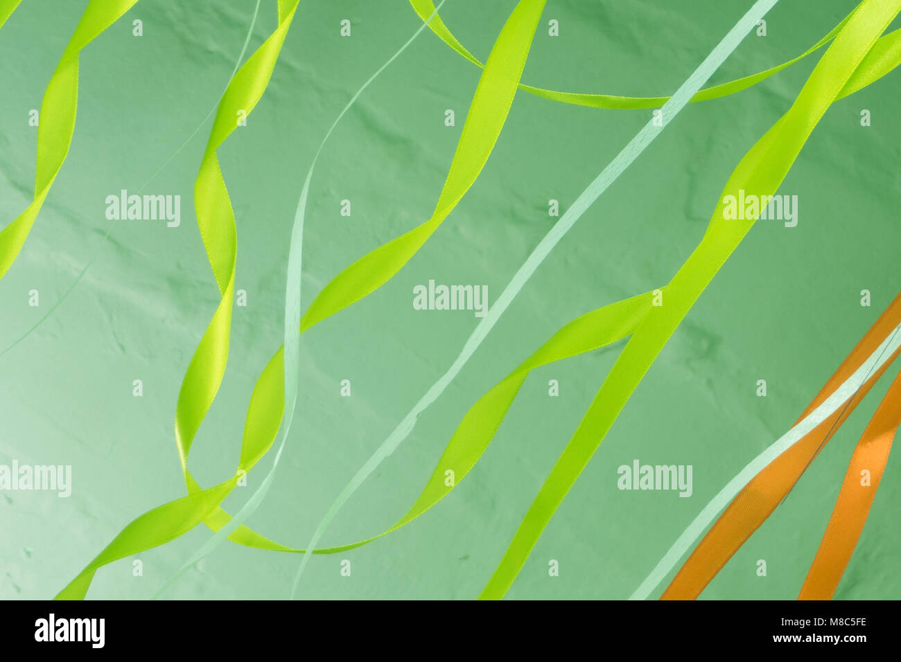 Colorful Paper Streamers Background. Green and Yellow Carnival Party ...