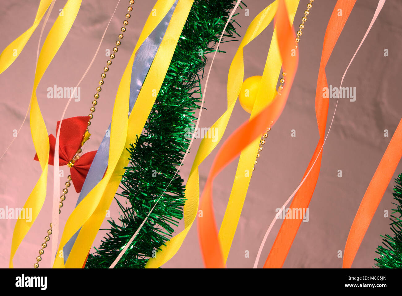 four color curly ribbons on white background Stock Photo - Alamy