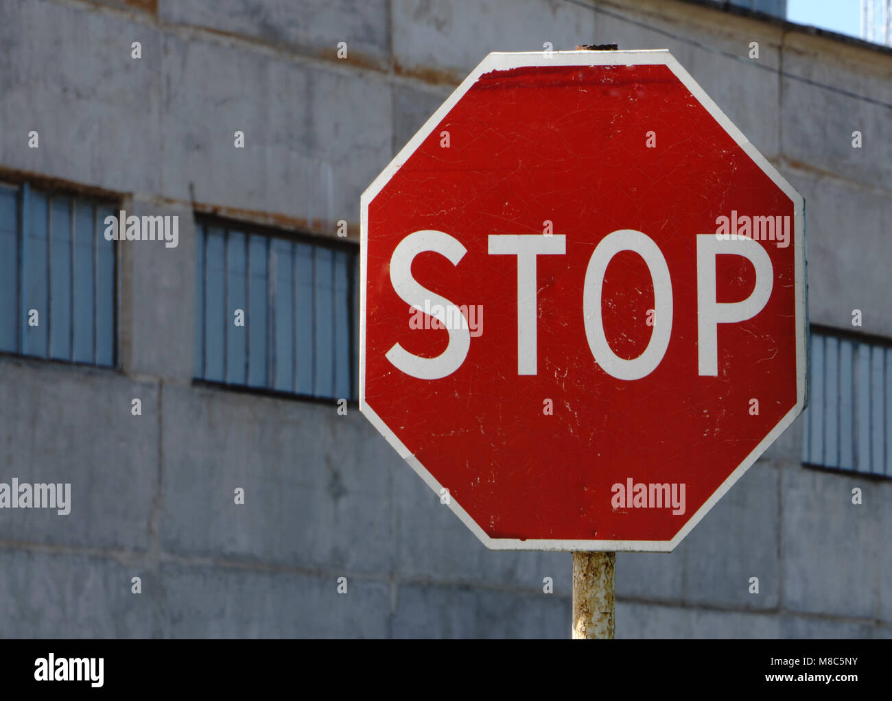 Stop road sign attention Stock Photo - Alamy