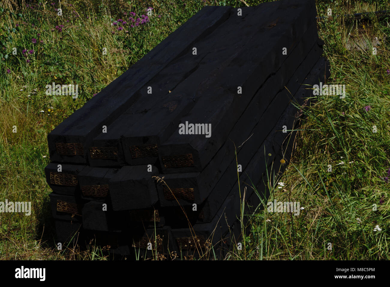 Stack of old railway sleepers hi-res stock photography and images - Alamy