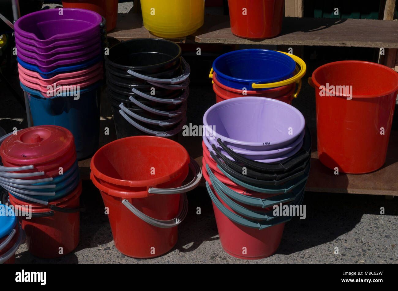 pyramid plastic colored buckets Stock Photo - Alamy