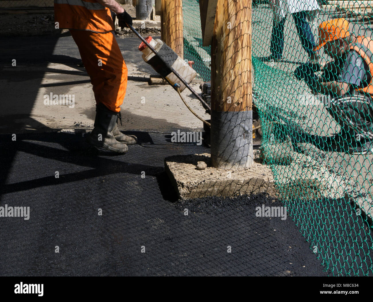 asphalt tarmac patch on concrete ground repair pavement road in parking ...