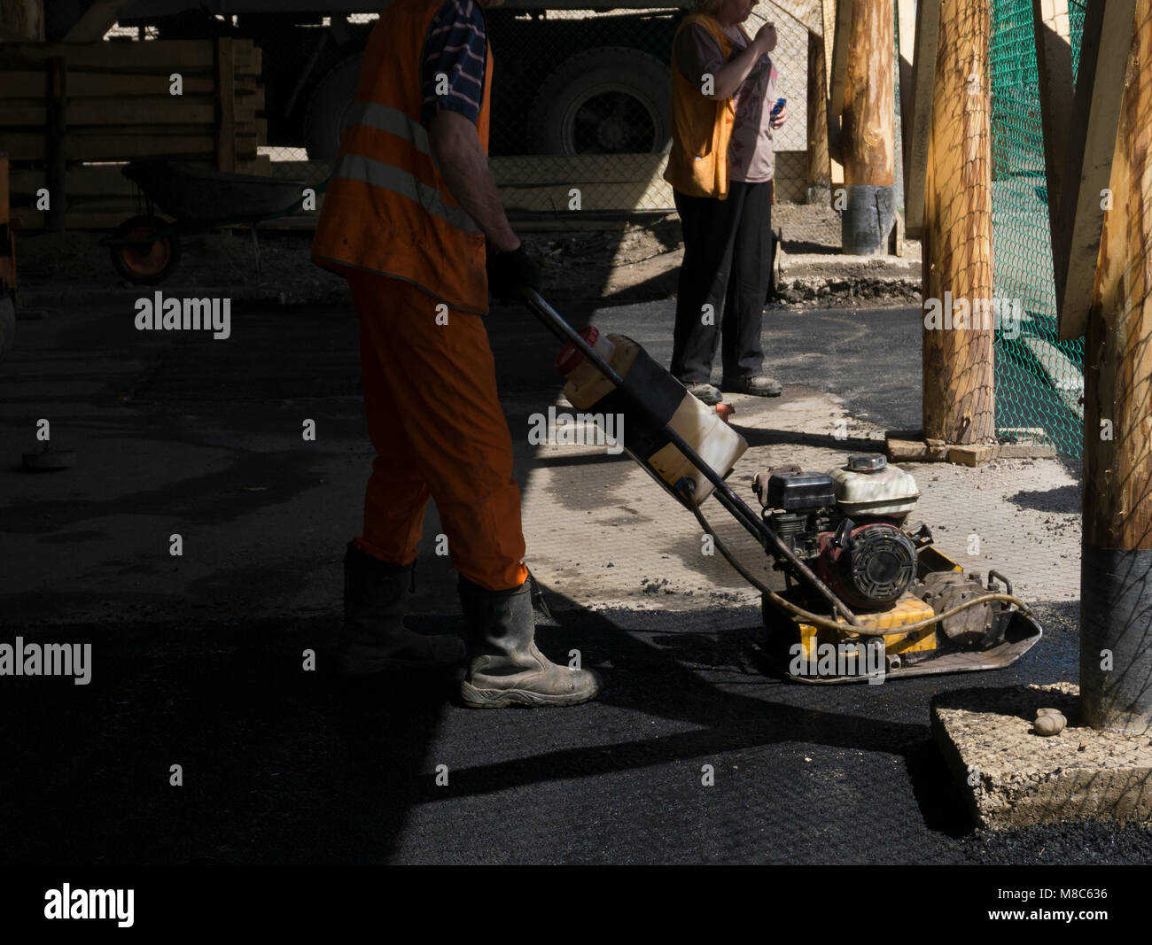 asphalt tarmac patch on concrete ground repair pavement road in parking ...