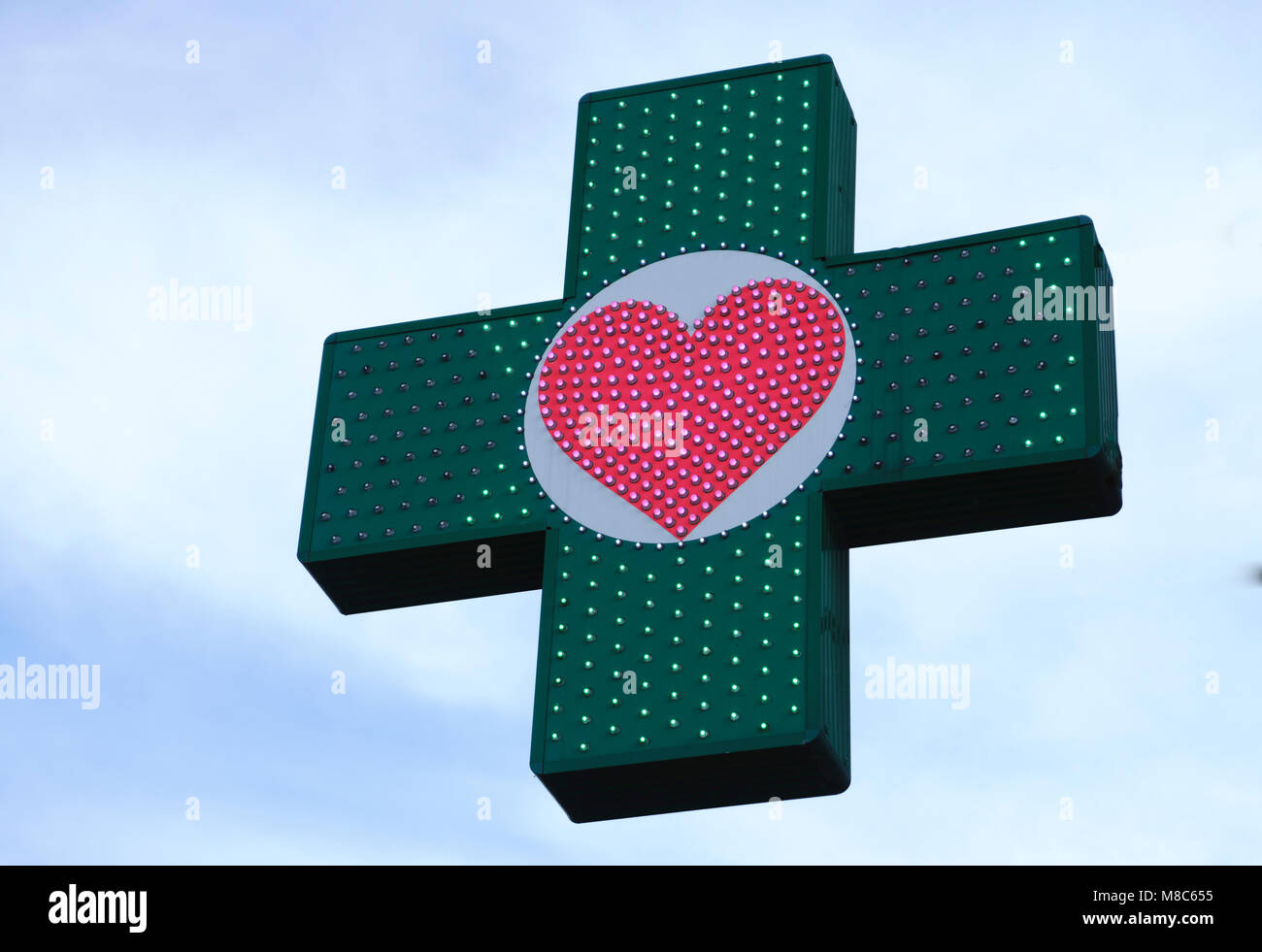 Image cross with heart shape background Stock Photo - Alamy