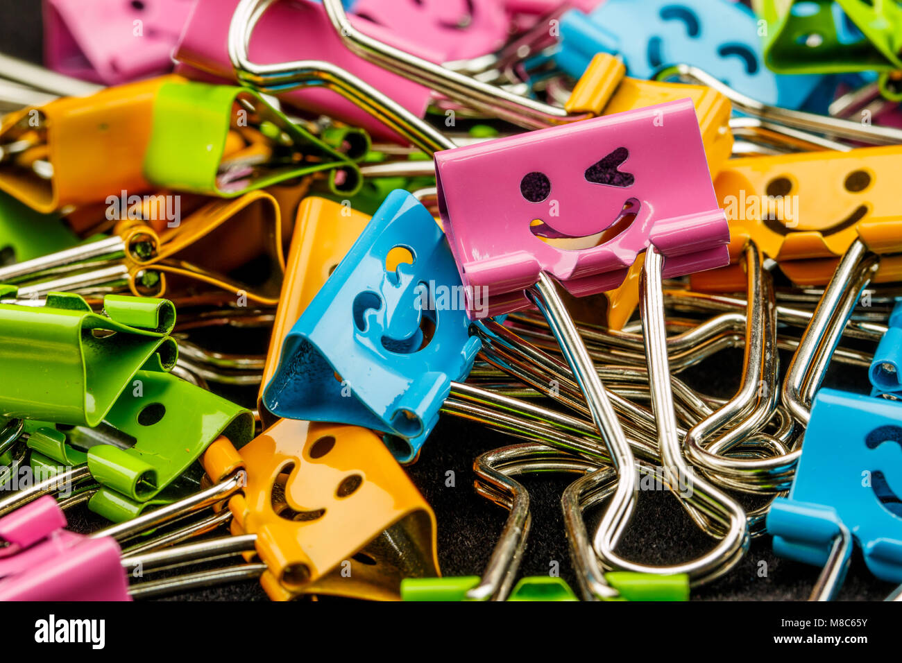 Orange binder clip hi-res stock photography and images - Alamy