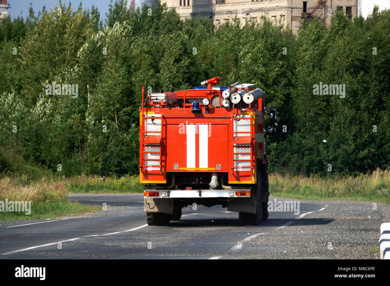 red Fire truck rides at the fire Stock Photo - Alamy