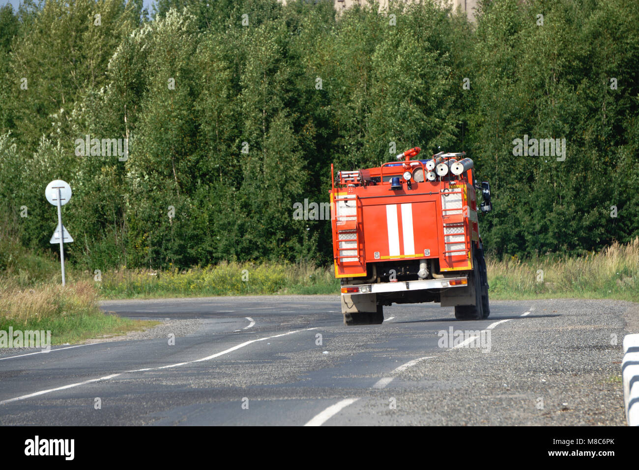 red Fire truck rides at the fire Stock Photo - Alamy