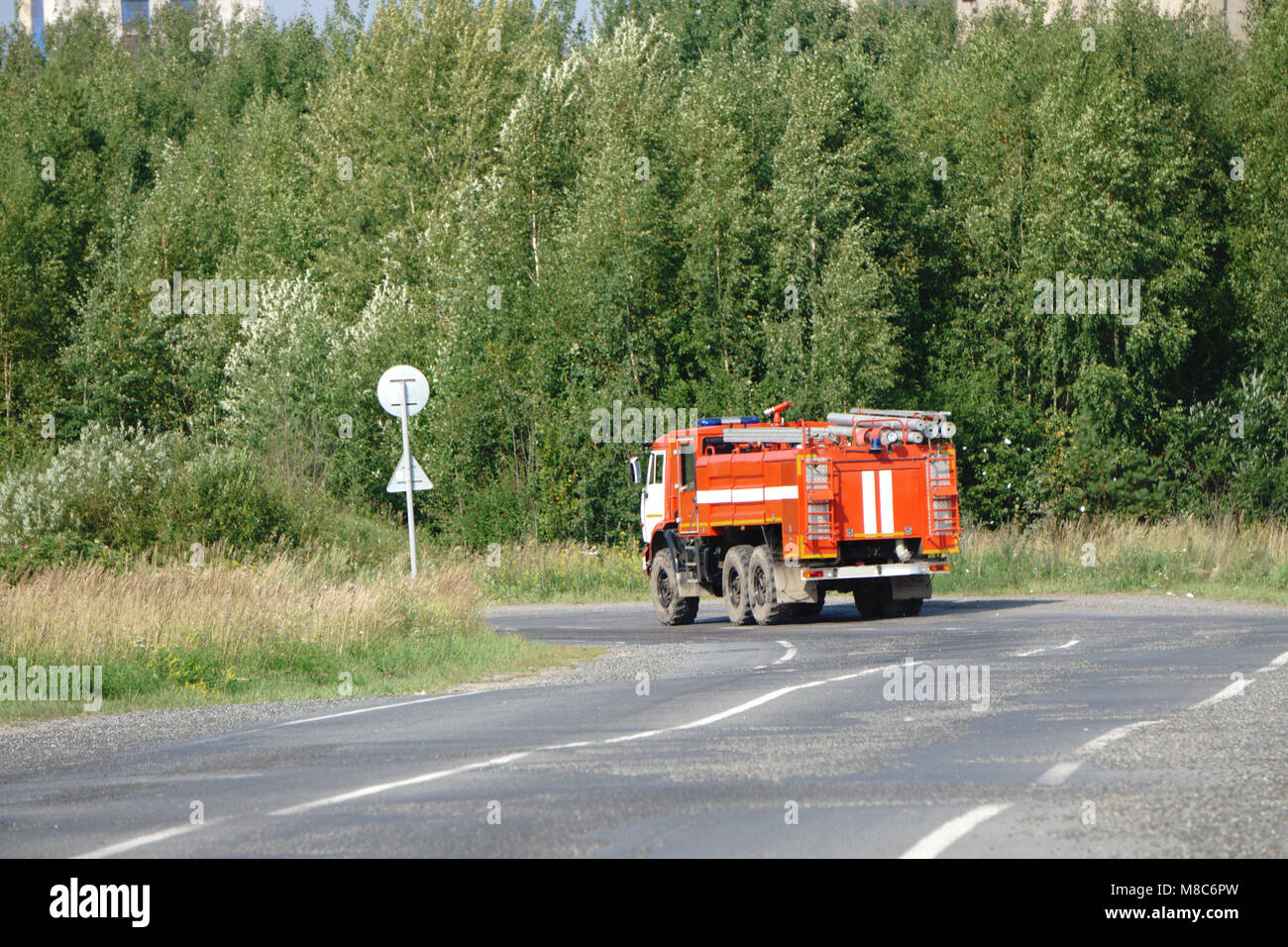 red Fire truck rides at the fire Stock Photo - Alamy