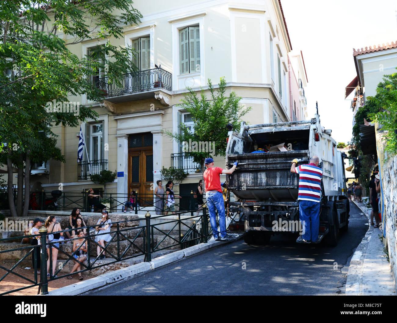 Garbage collection in the old town of Athens Stock Photo - Alamy