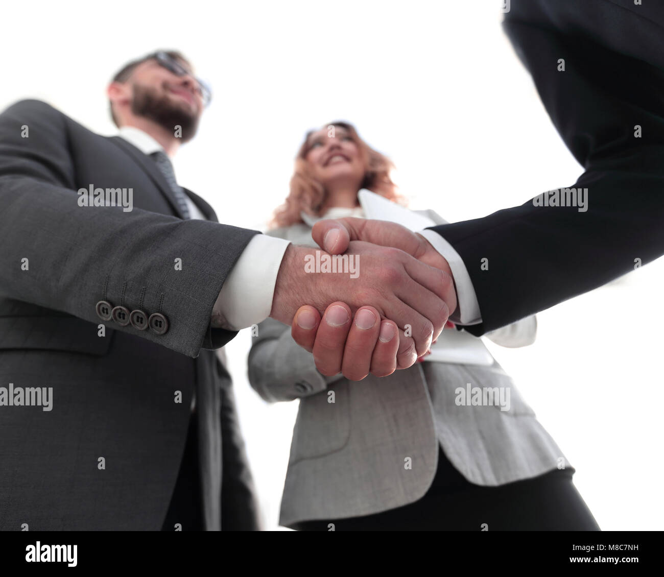 Photo of handshake of two happy businessmen Stock Photo - Alamy
