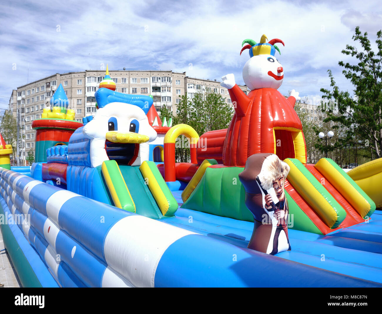 Big, colorful, inflatable castle labyrinth Stock Photo - Alamy