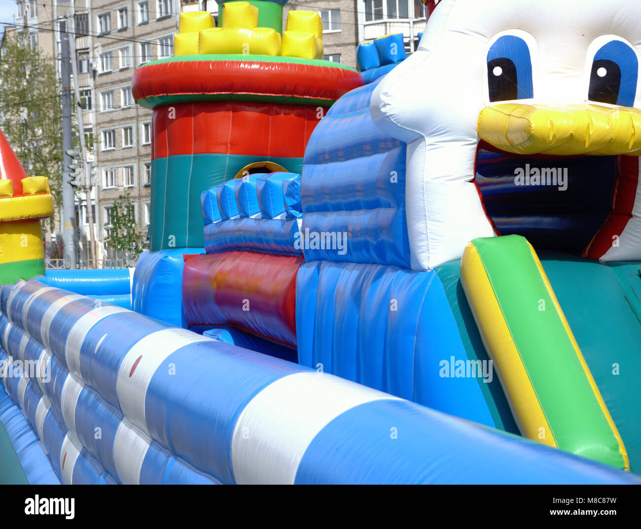 Big, colorful, inflatable castle labyrinth Stock Photo - Alamy