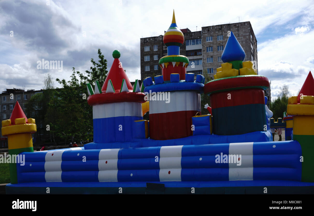 Big, colorful, inflatable castle labyrinth Stock Photo - Alamy