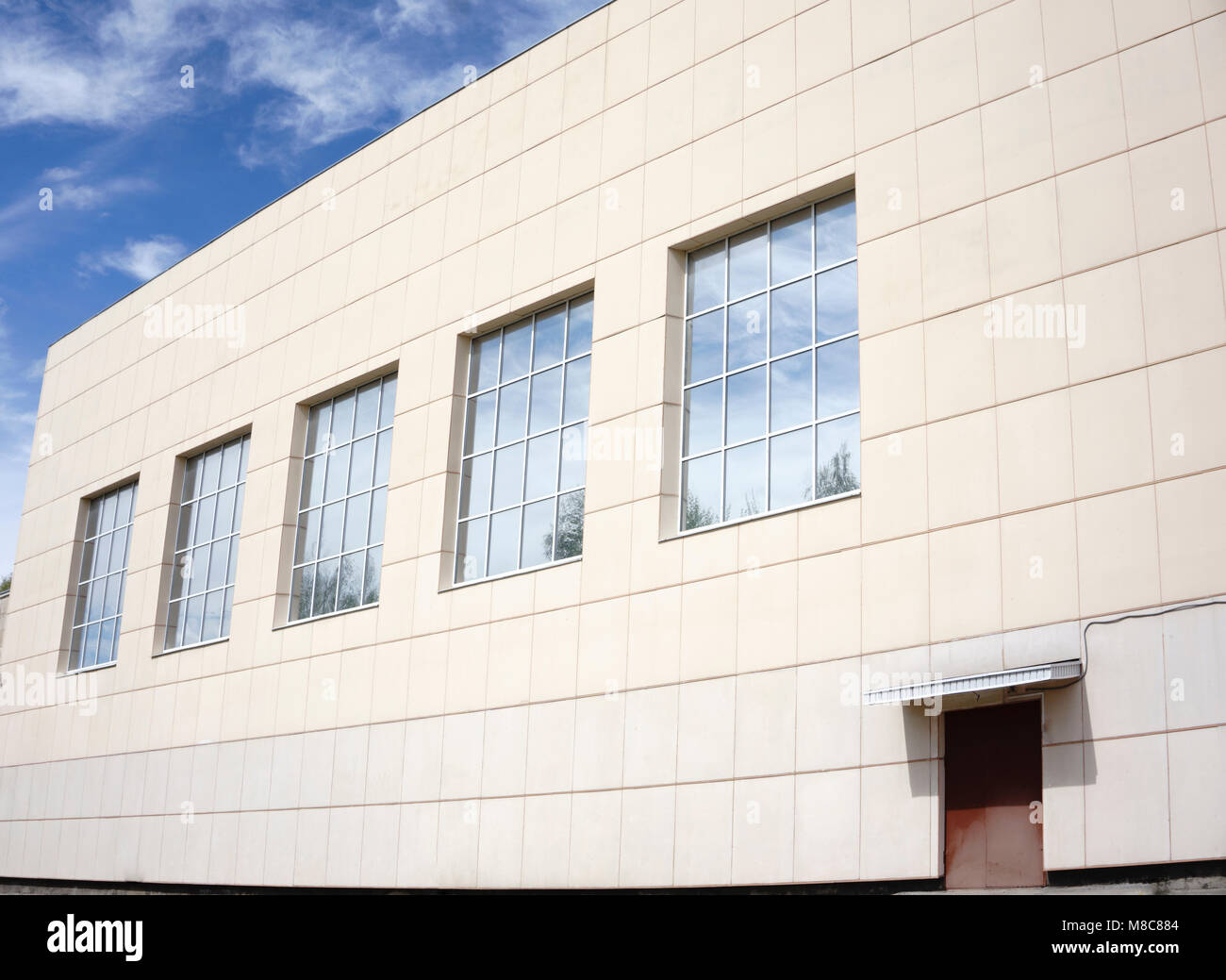 Building with facade cladding, close up Stock Photo - Alamy